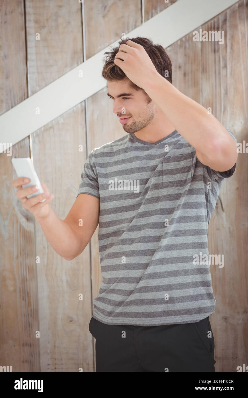 Man using smart phone in cool office hi-res stock photography and ...