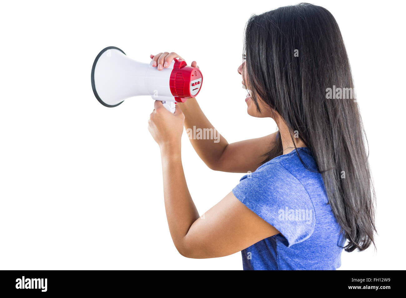 Woman shouting into a megaphone Stock Photo - Alamy