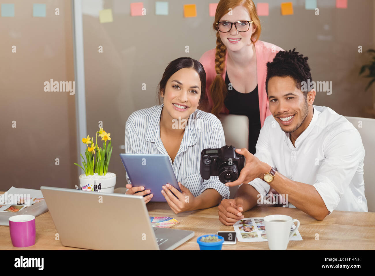 Business people with camera working in office Stock Photo - Alamy