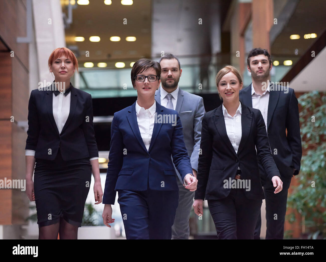 business people team walking Stock Photo - Alamy