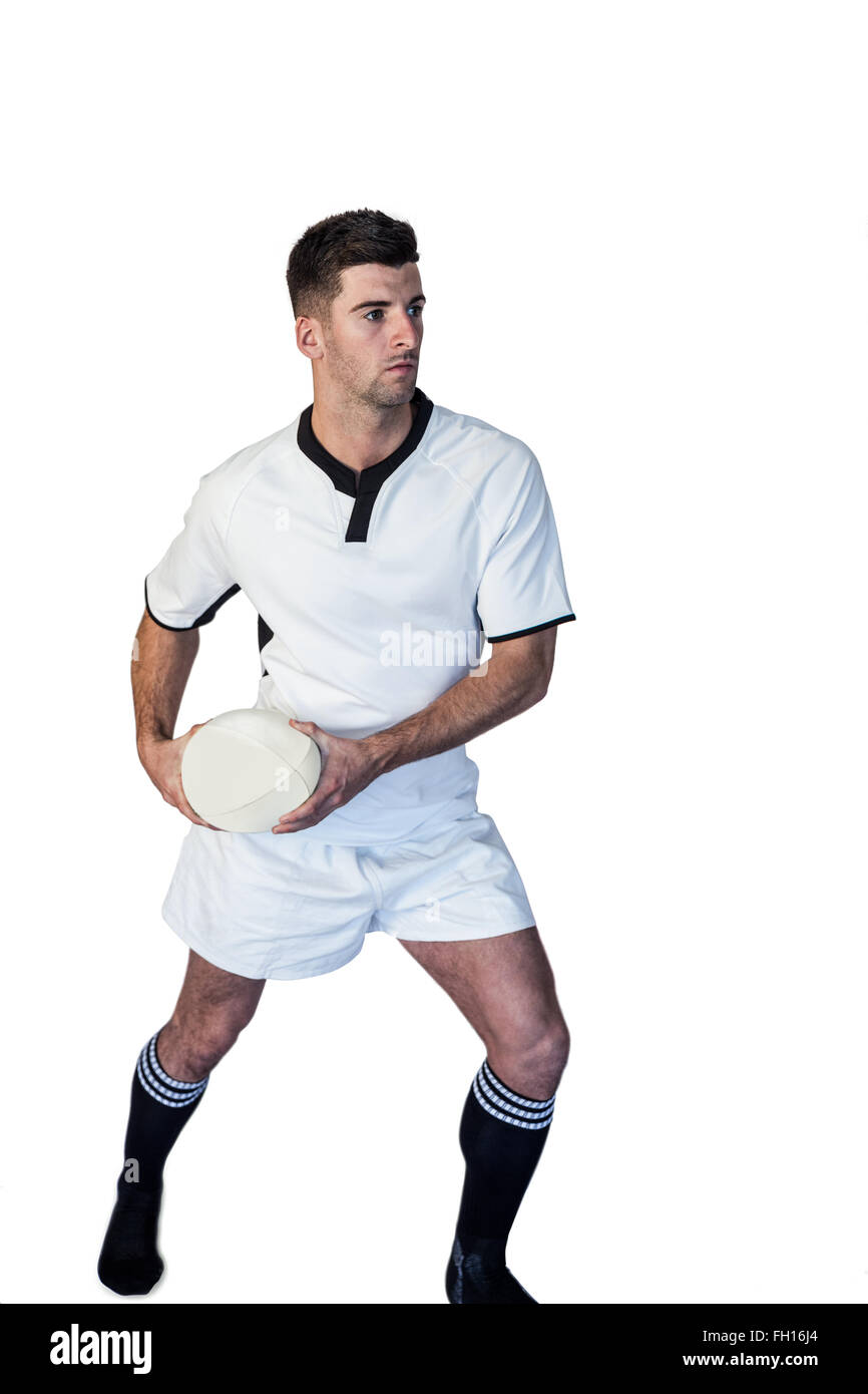 Rugby player defending with the ball Stock Photo - Alamy