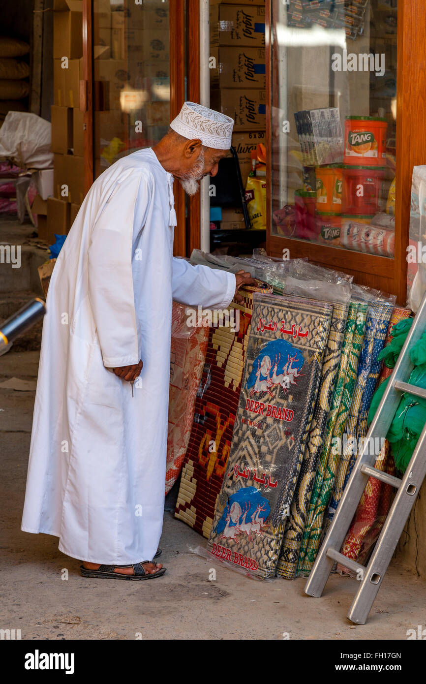 An Elderly Omani Man looking For Carpets/Rugs In The Nizwa Souk, Nizwa ...