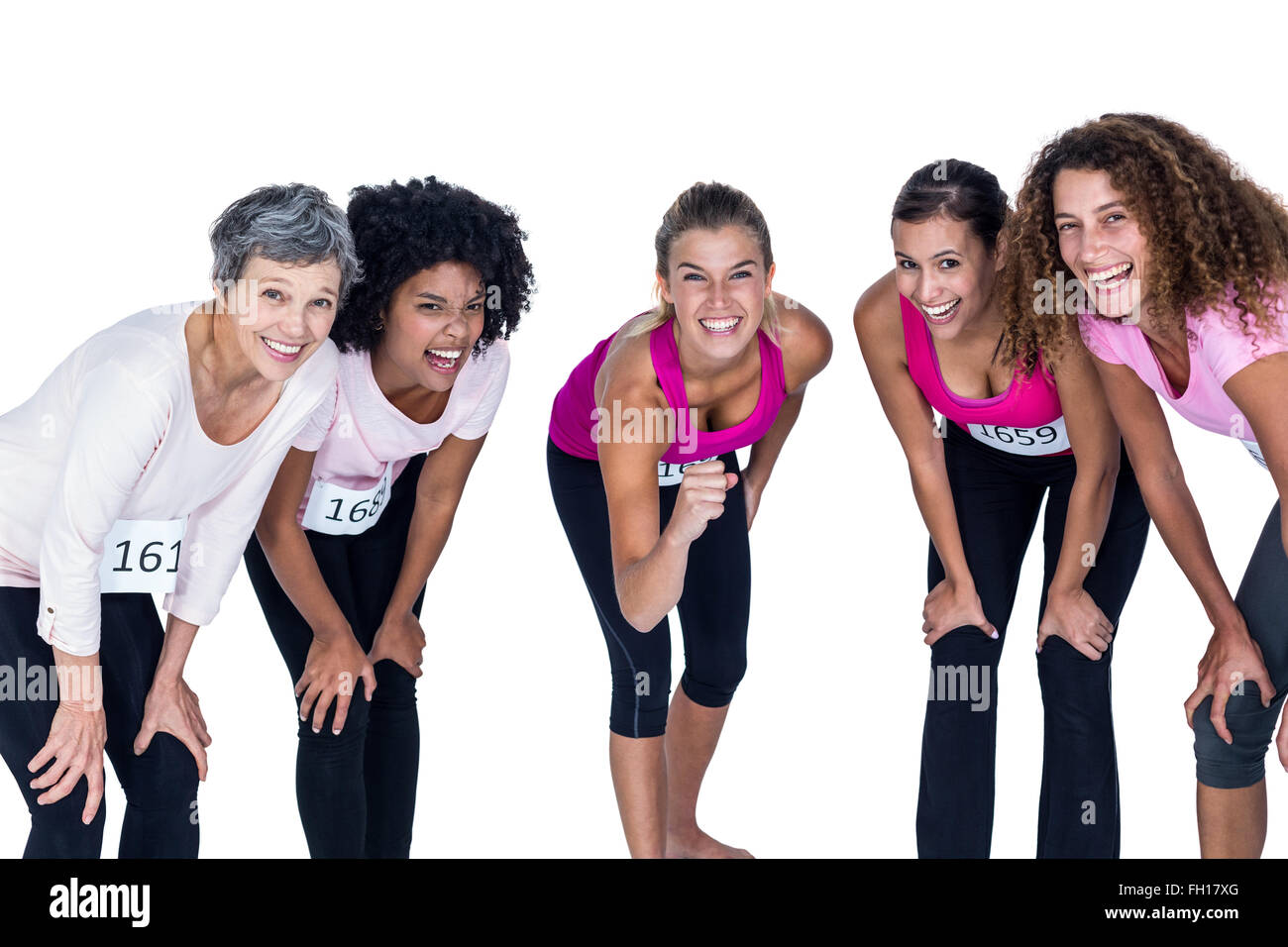 Portrait of happy athletes bending Stock Photo - Alamy