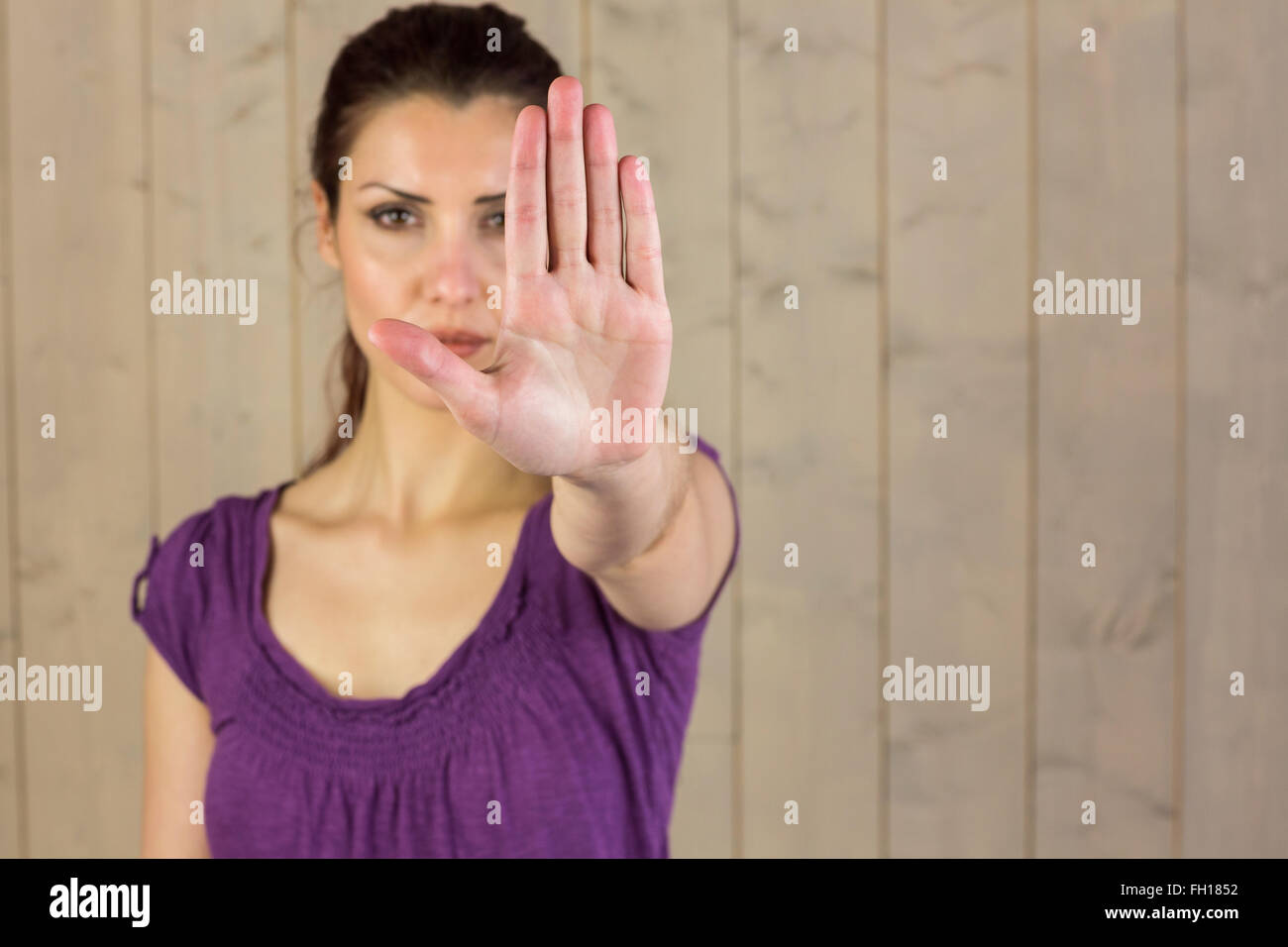 Portrait of beautiful woman with stop sign Stock Photo - Alamy