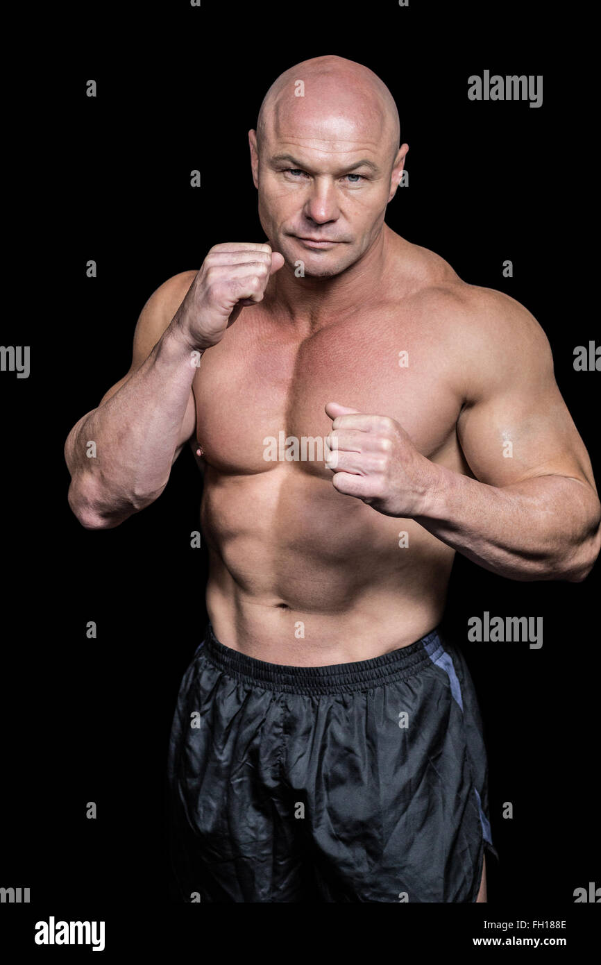 Portrait of bald man with boxing pose Stock Photo - Alamy