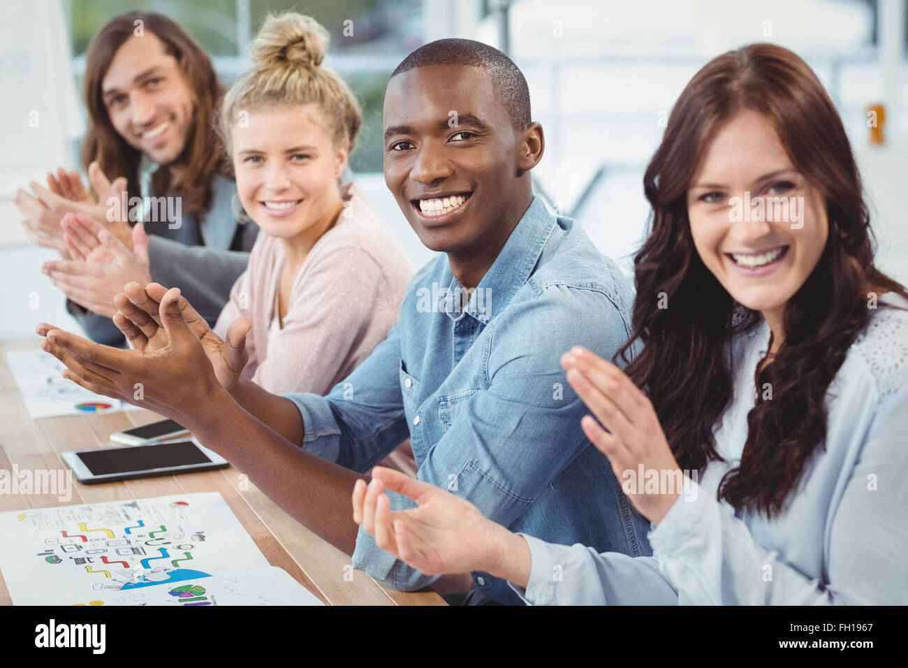 Portrait young man clapping team hi-res stock photography and images ...