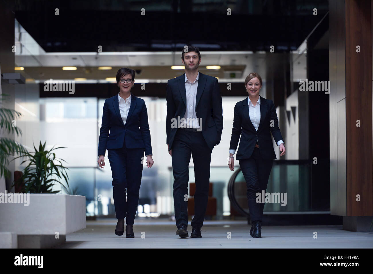 business people team walking Stock Photo - Alamy
