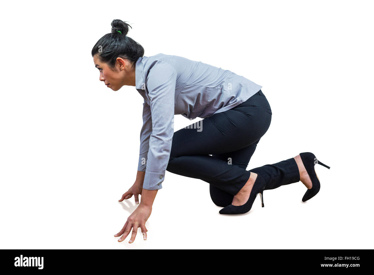 Woman in position for a run Stock Photo - Alamy