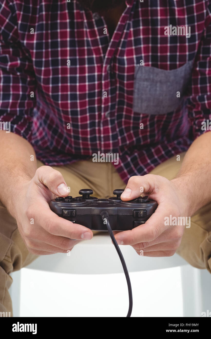 Man playing video game Stock Photo - Alamy