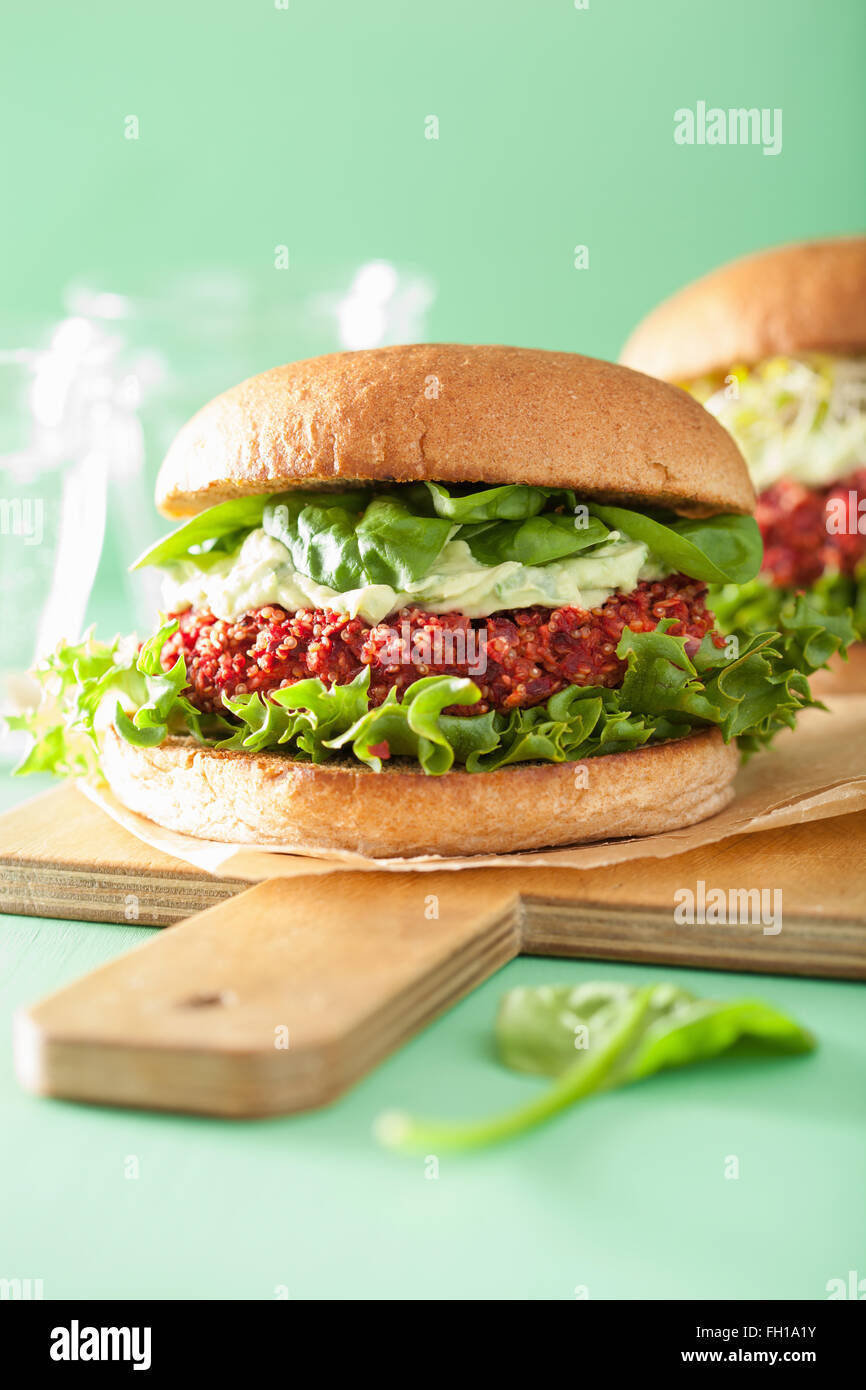 veggie beet and quinoa burger with avocado dressing Stock Photo - Alamy