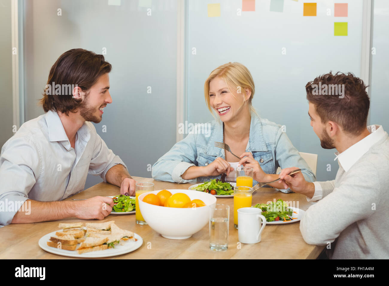 Businessman laughing during lunch hi-res stock photography and images ...