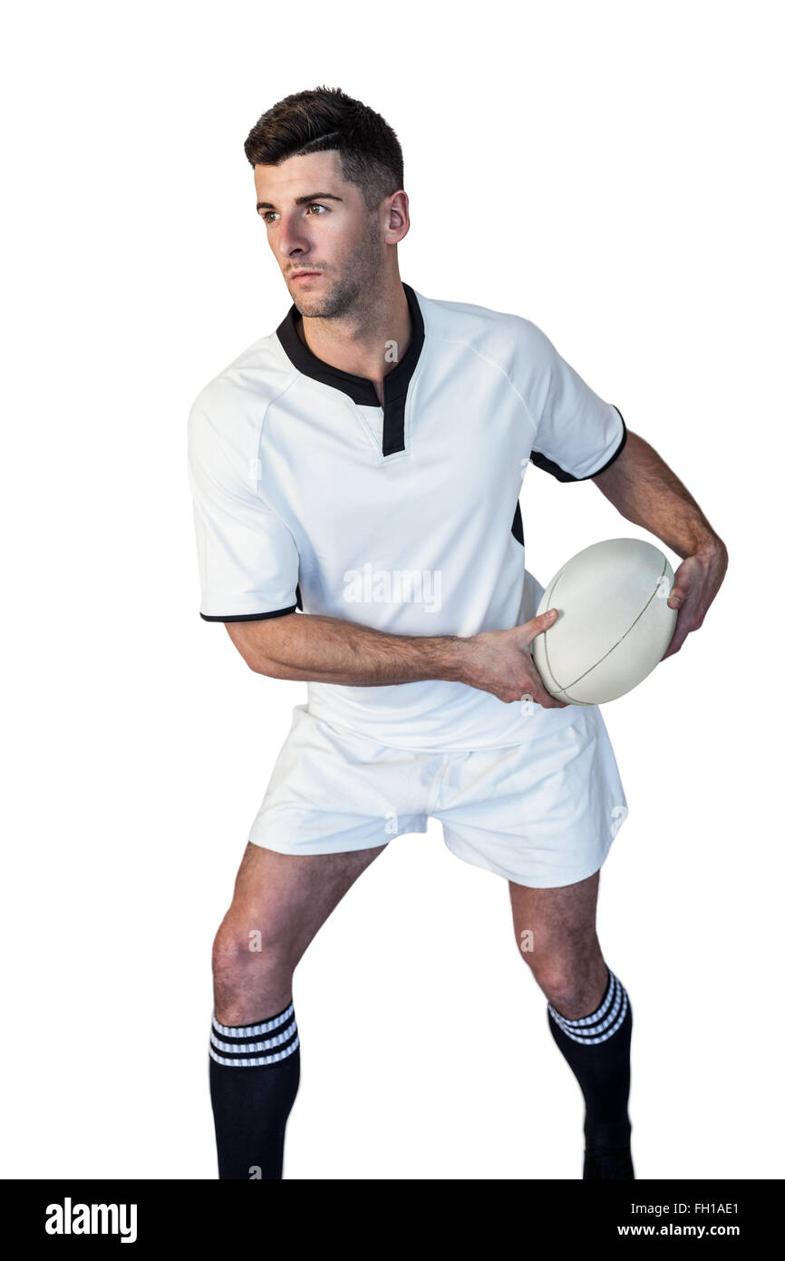 Rugby player defending the ball Stock Photo - Alamy