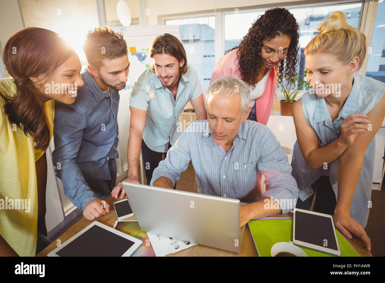 Business people using technologies Stock Photo - Alamy