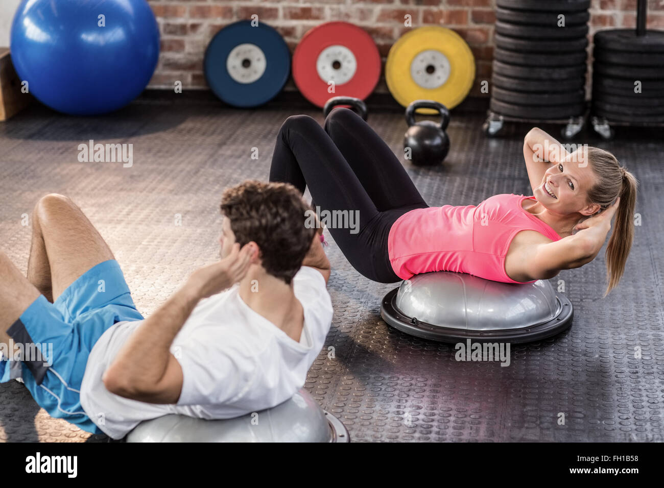 Beautiful woman athlete doing crunches hi-res stock photography and ...