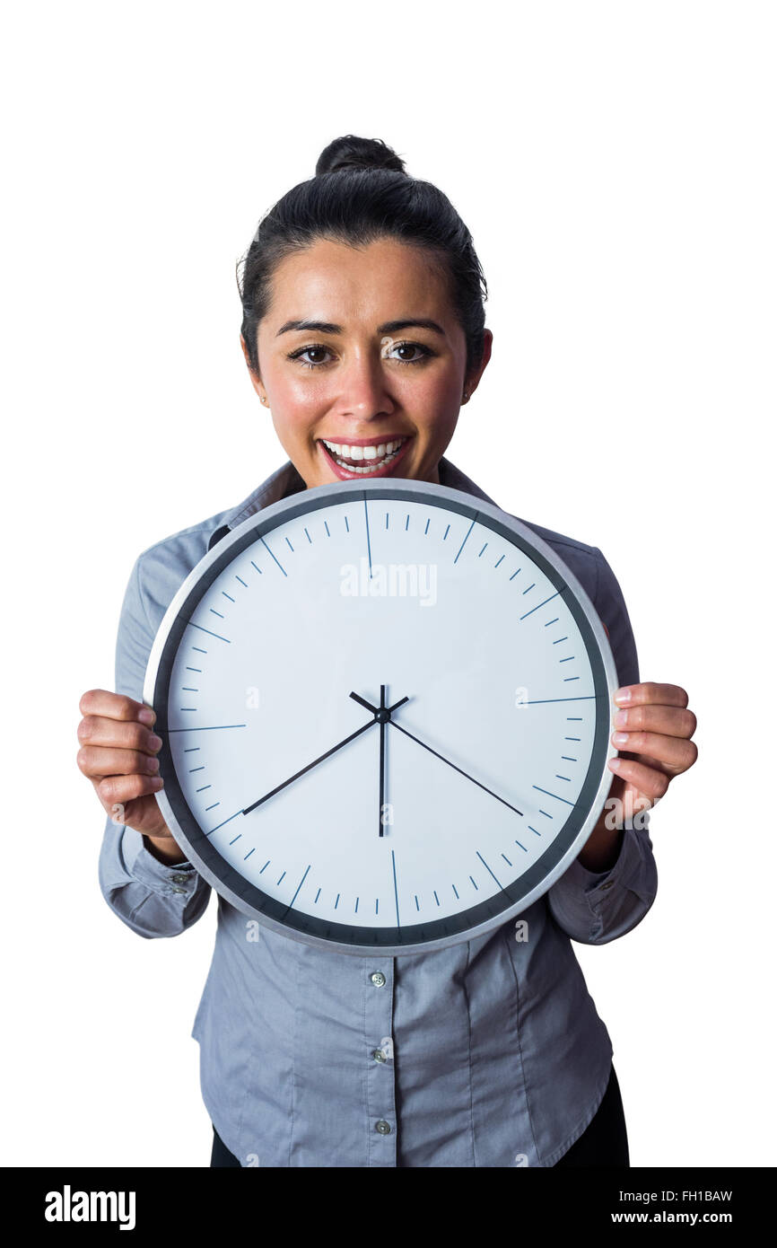 Happy woman showing her large clock Stock Photo - Alamy