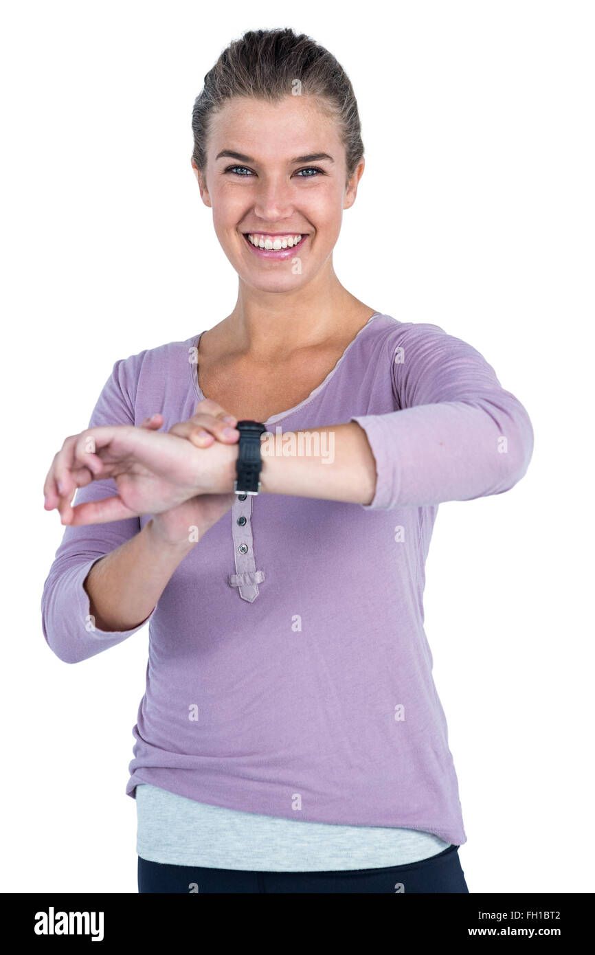 Portrait of happy young woman wearing wristwatch Stock Photo - Alamy