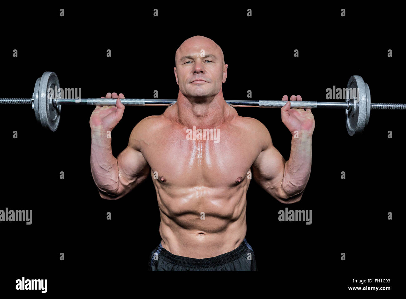 Portrait of confident man lifting crossfit Stock Photo - Alamy