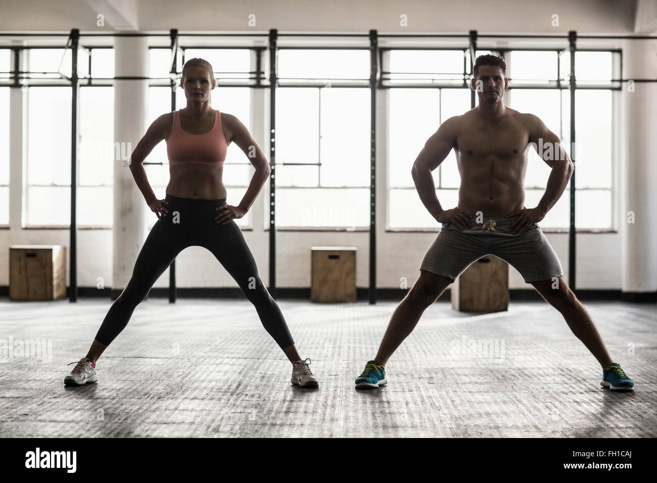 Two fit people doing fitness Stock Photo - Alamy