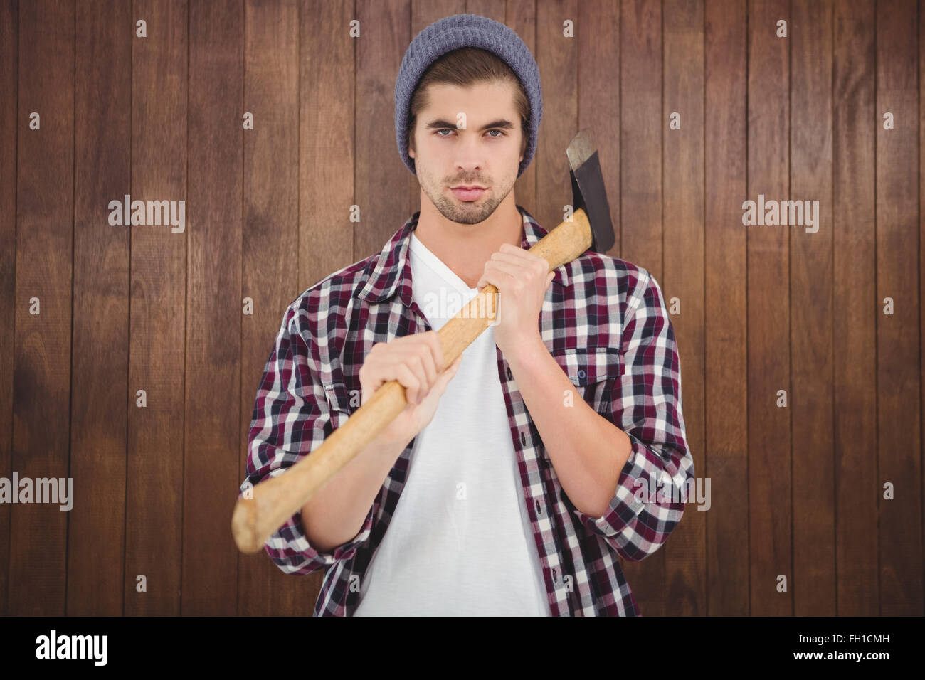 Portrait of confident man holding axe on shoulder Stock Photo - Alamy