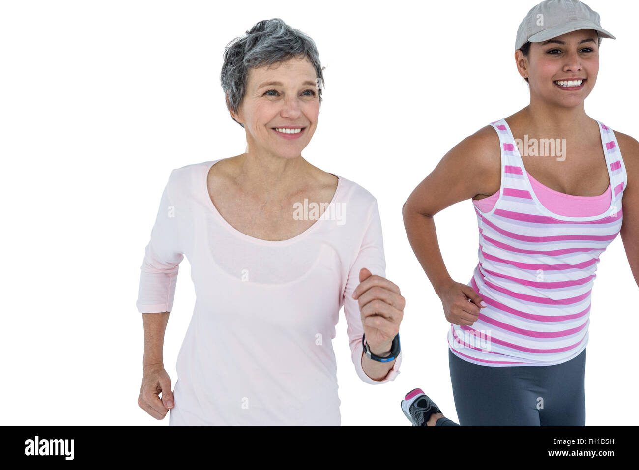 Happy fit women jogging Stock Photo - Alamy