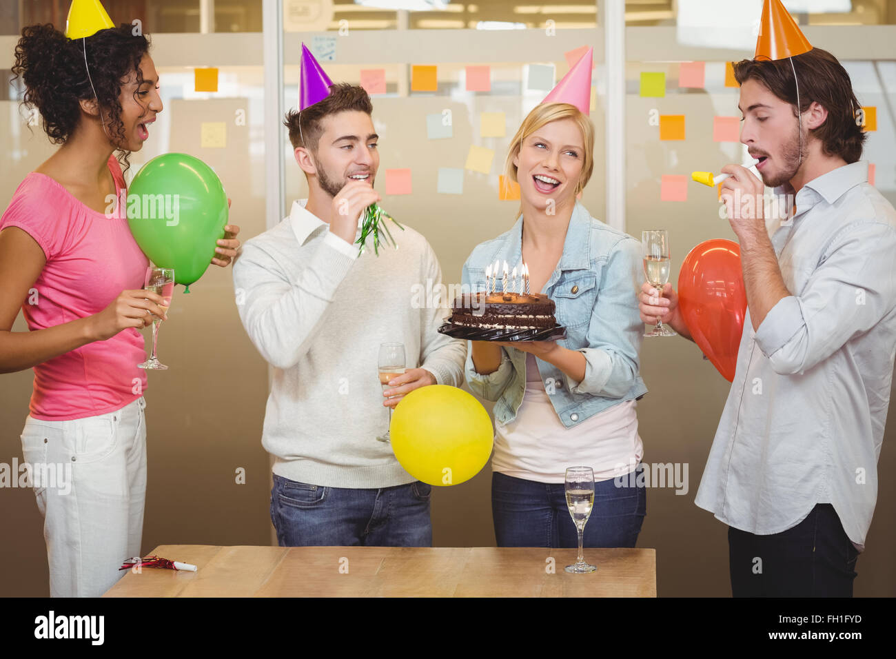 Colleagues enjoying birthday party Stock Photo - Alamy