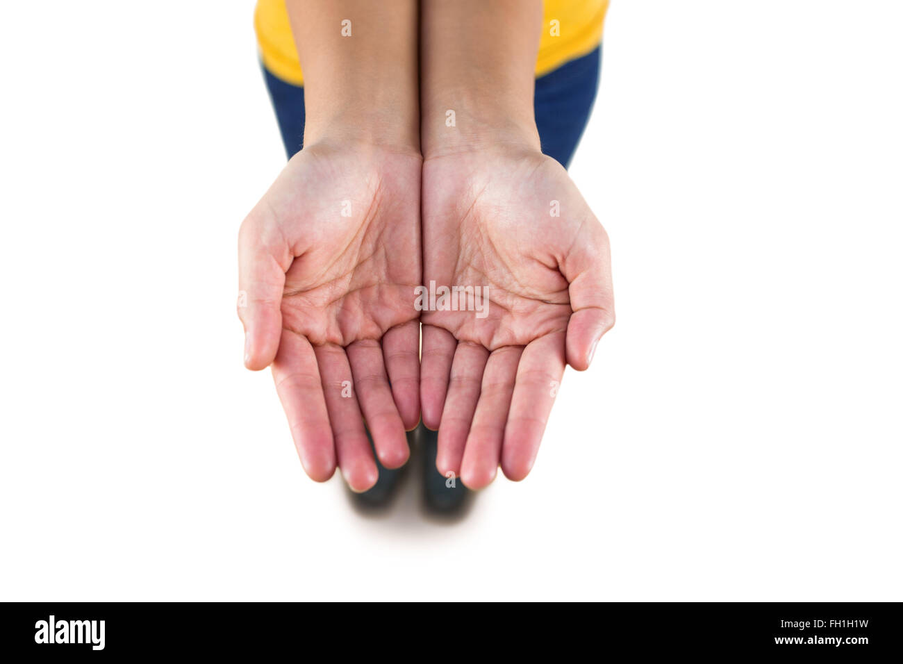 Woman standing with her hands out Stock Photo - Alamy