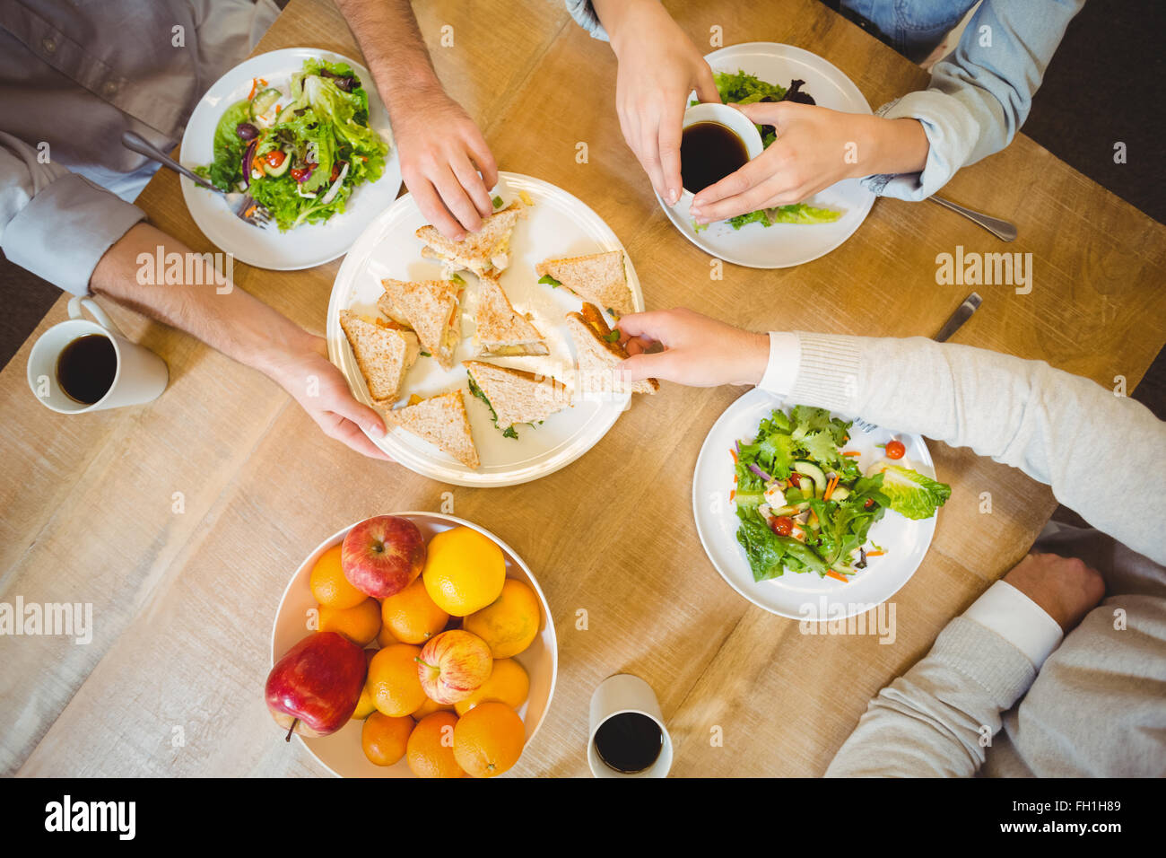 Business people having lunch in canteen Stock Photo - Alamy