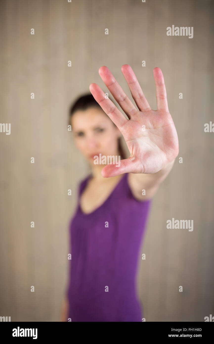 Portrait of woman with stop sign Stock Photo - Alamy