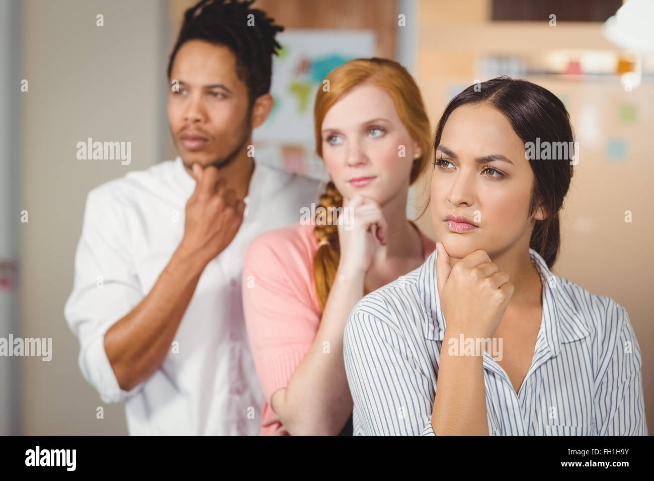 Business people thinking at office Stock Photo - Alamy
