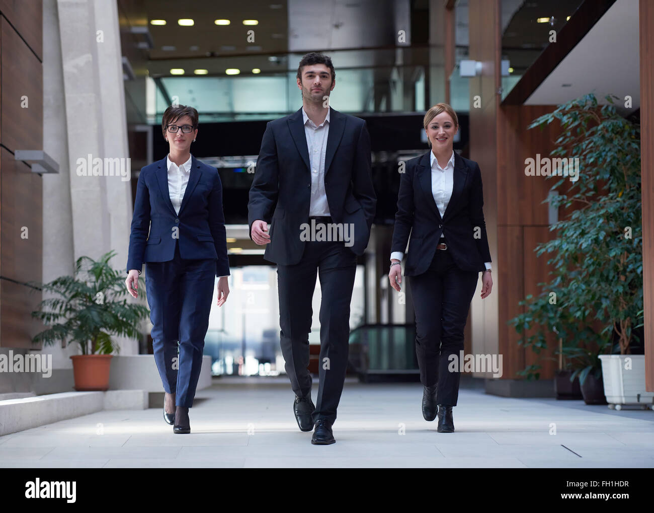 business people team walking Stock Photo - Alamy