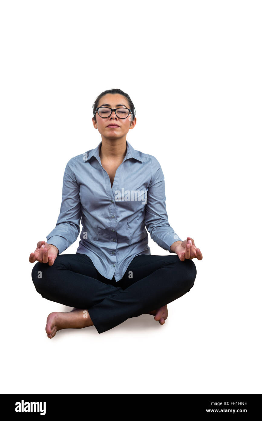 Woman meditating with her legs crossed Stock Photo - Alamy