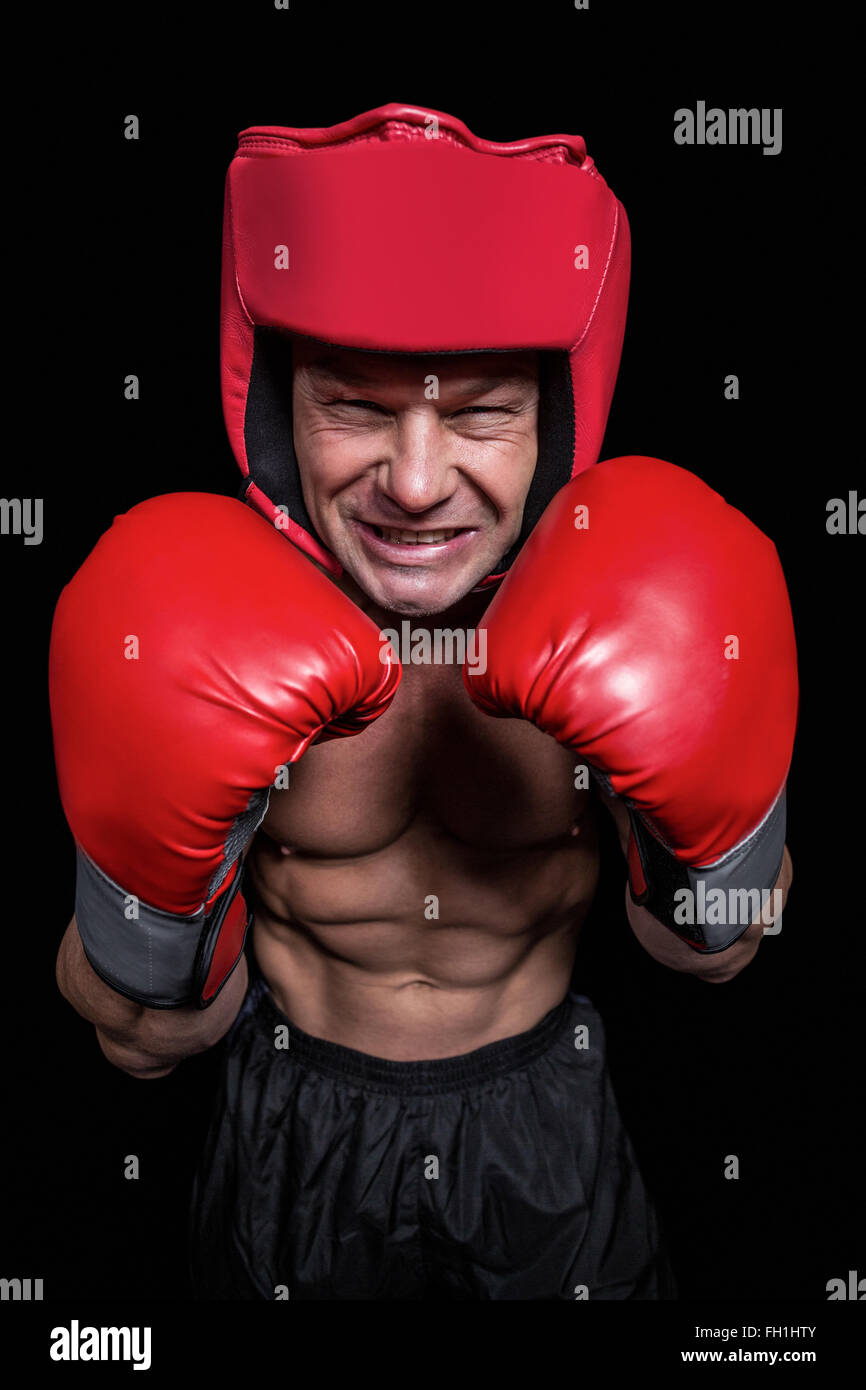 Angry boxer with gloves and headgear Stock Photo - Alamy