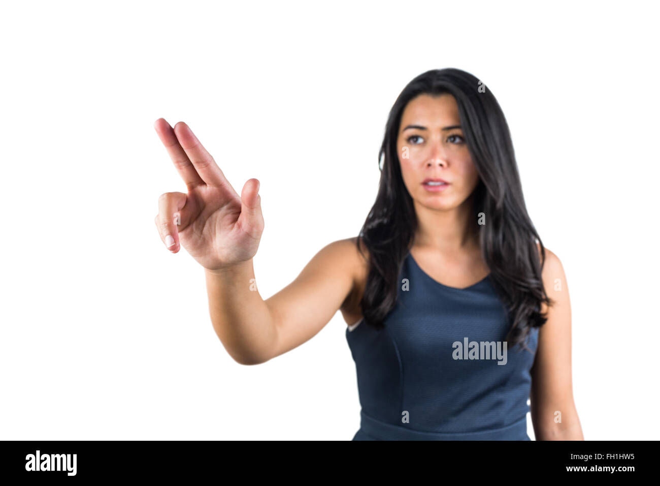Woman pointing her fingers forward Stock Photo - Alamy