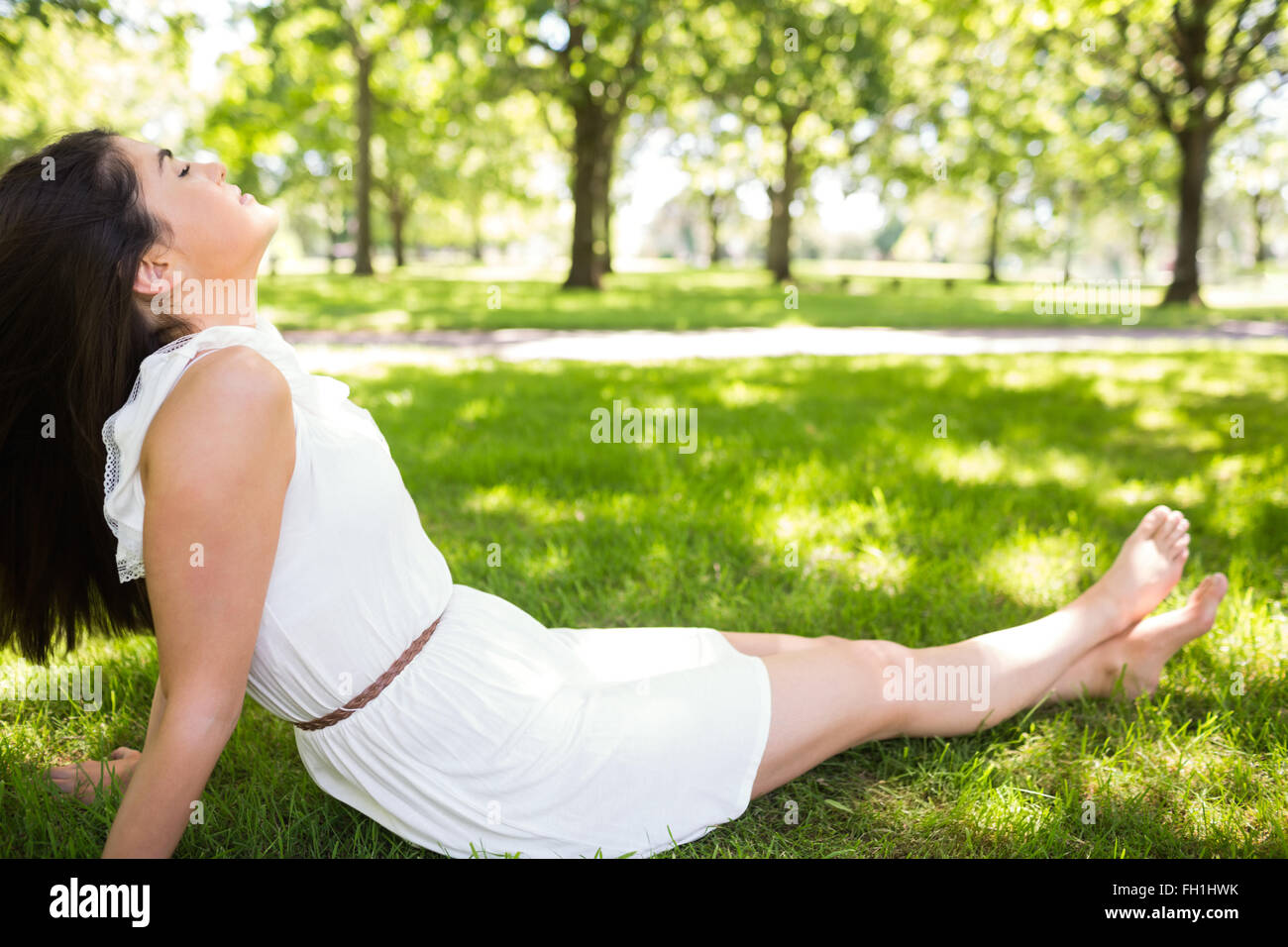 Pretty woman relaxing with eyes closed Stock Photo - Alamy