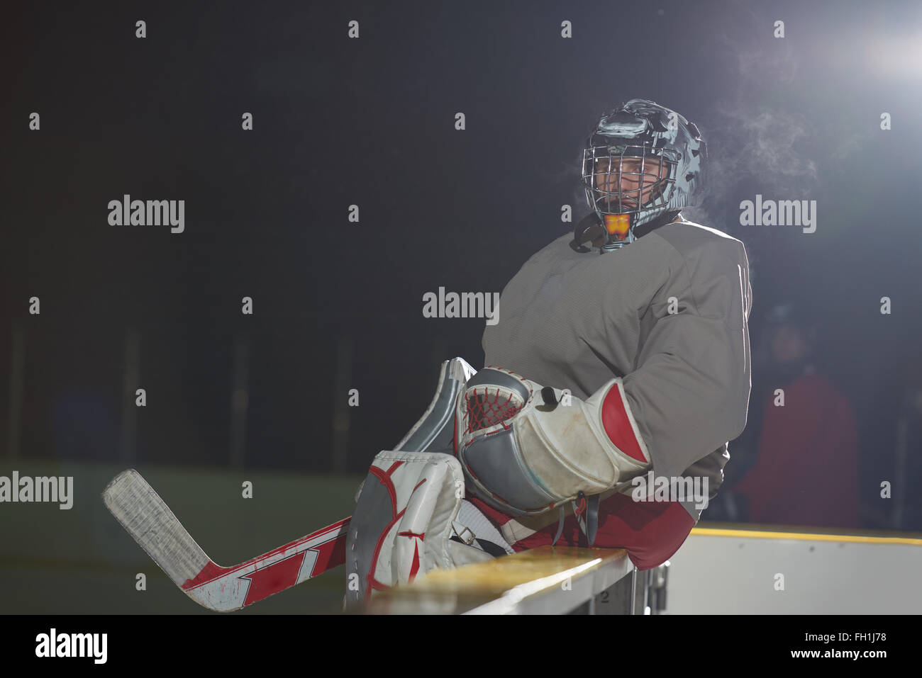 ice hockey players on bench Stock Photo - Alamy