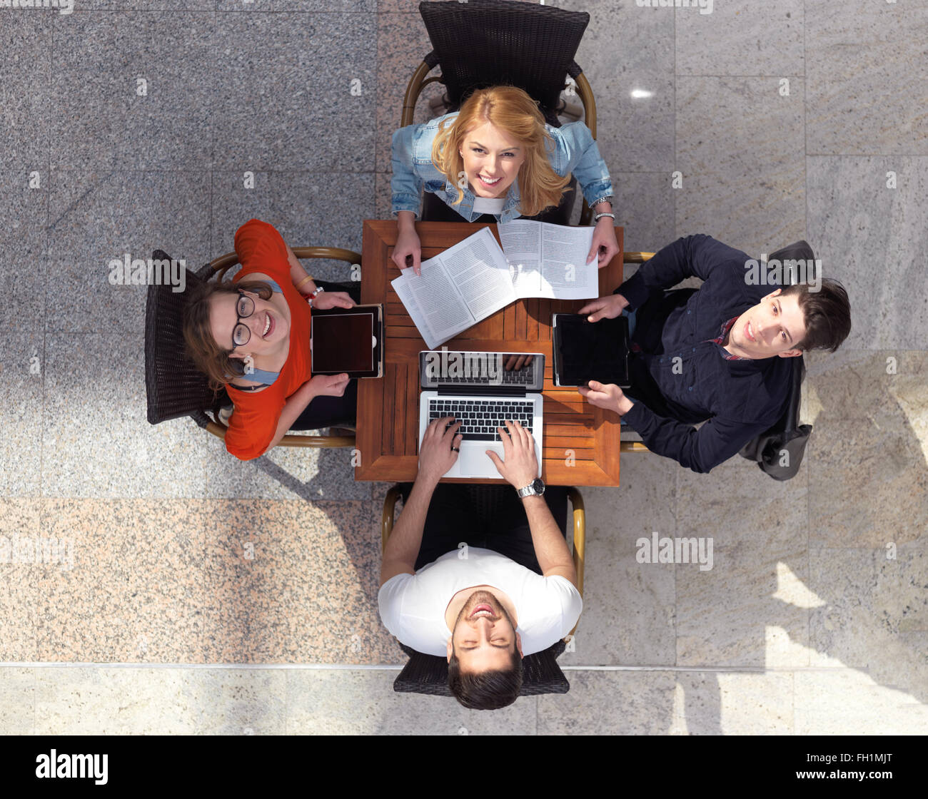 students group working on school project together Stock Photo - Alamy