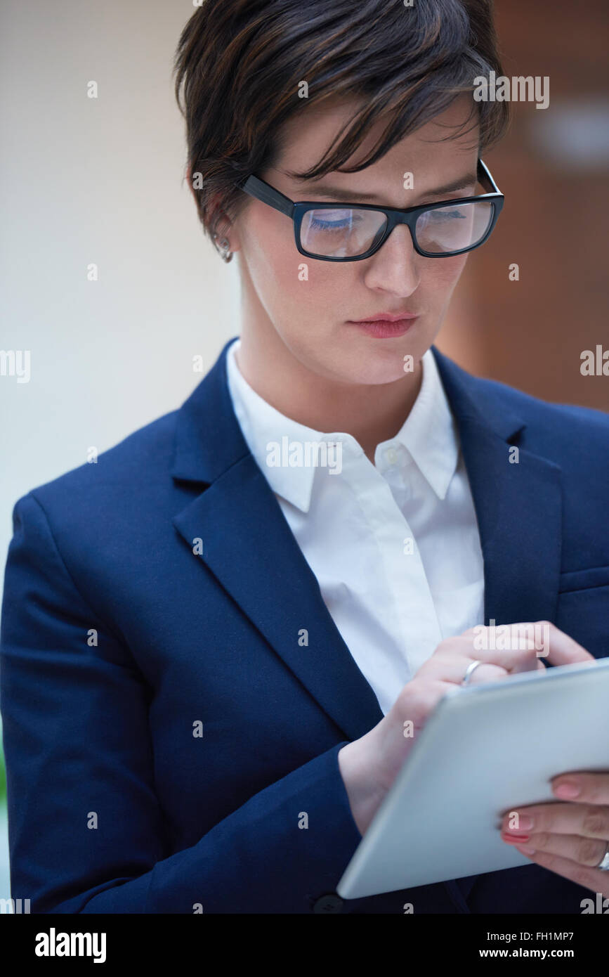 business woman working on tablet Stock Photo - Alamy