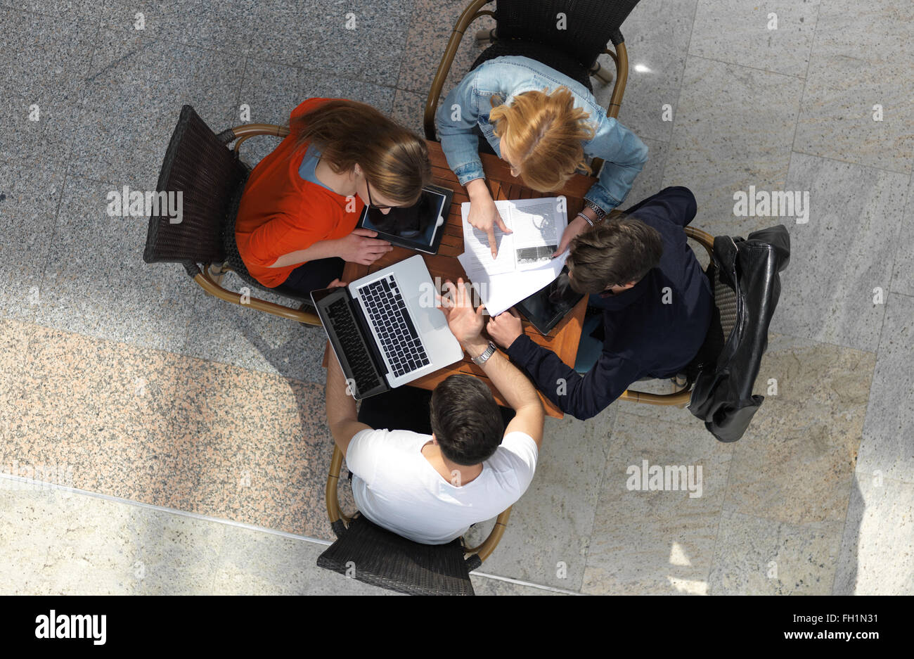 students group working on school project together Stock Photo - Alamy