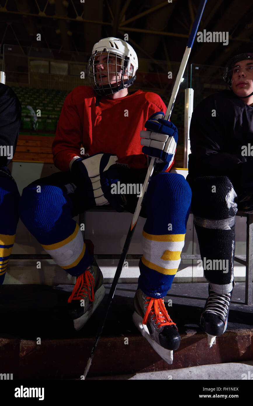 ice hockey players on bench Stock Photo - Alamy