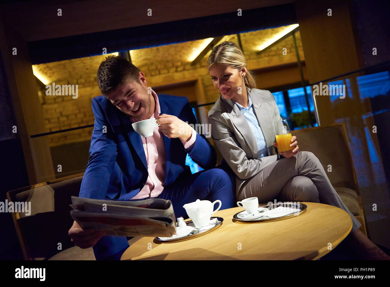 business couple take drink after work Stock Photo - Alamy