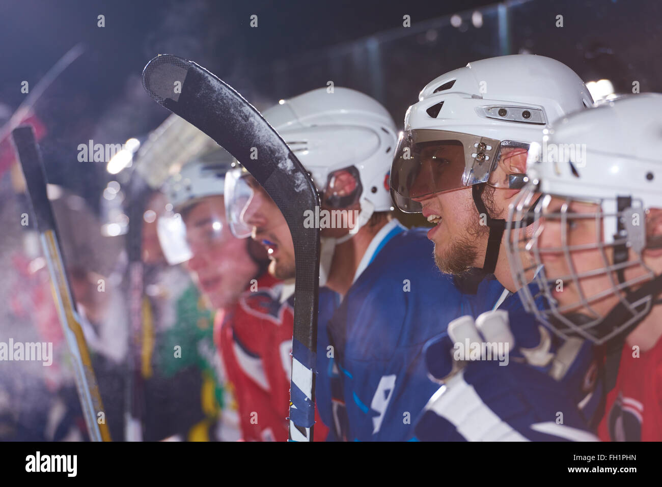 ice hockey players on bench Stock Photo - Alamy