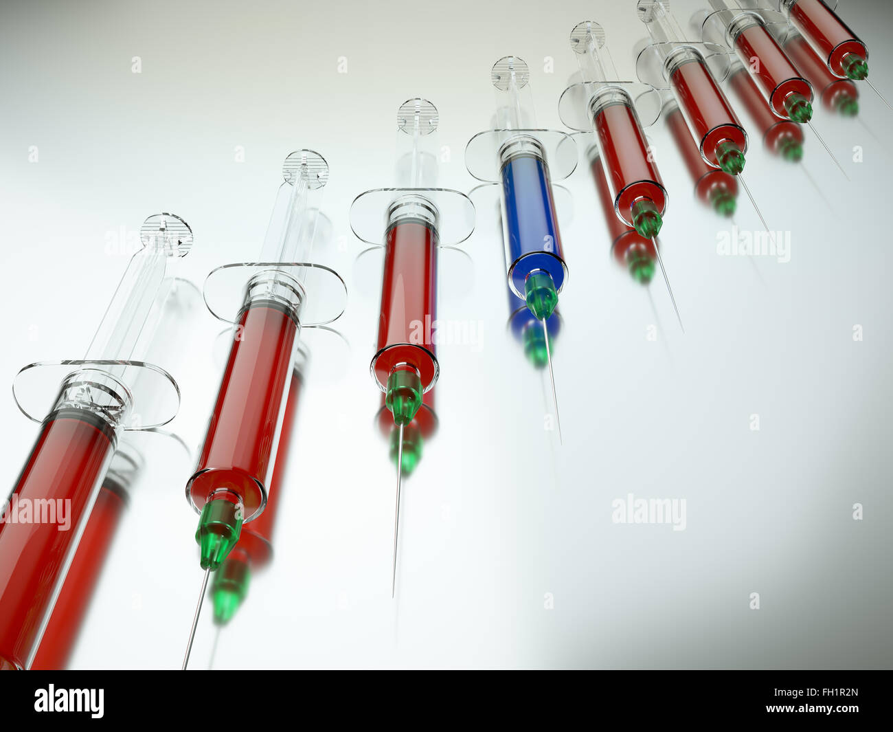 Red syringe among blue ones as right medical choice. Large resolution ...