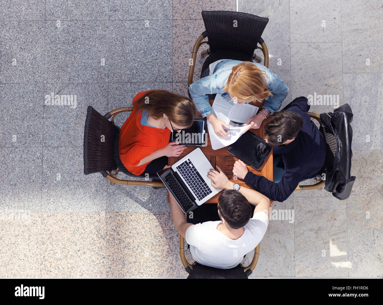 students group working on school project together Stock Photo - Alamy