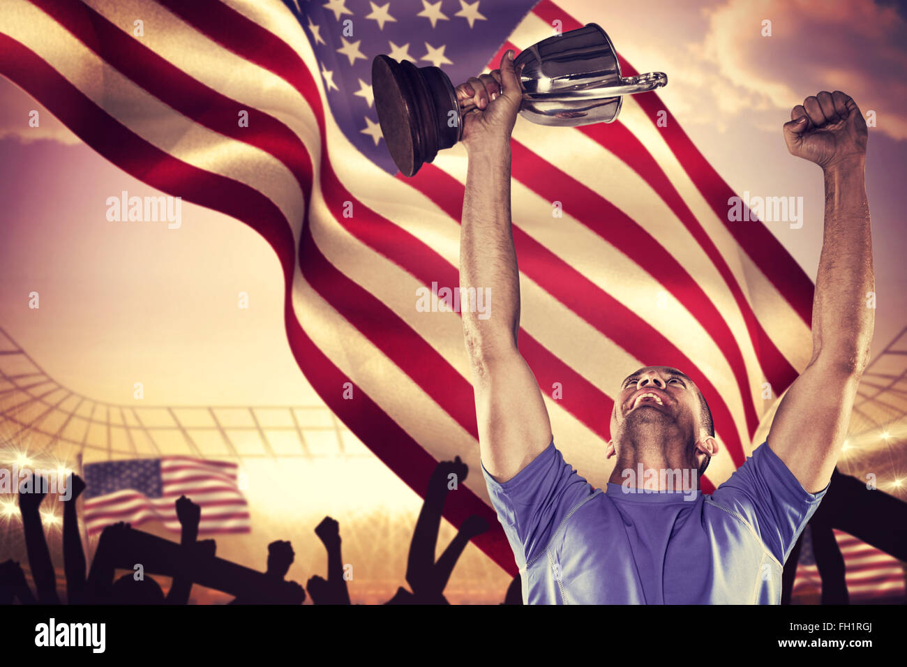 Composite image of happy rugby player holding trophy Stock Photo - Alamy