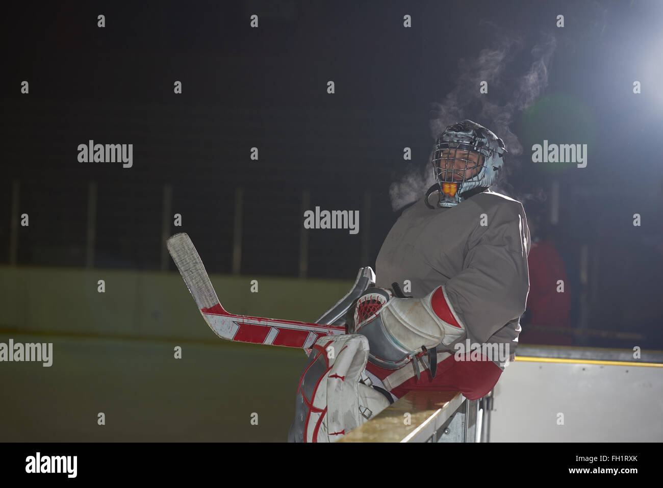 ice hockey players on bench Stock Photo - Alamy