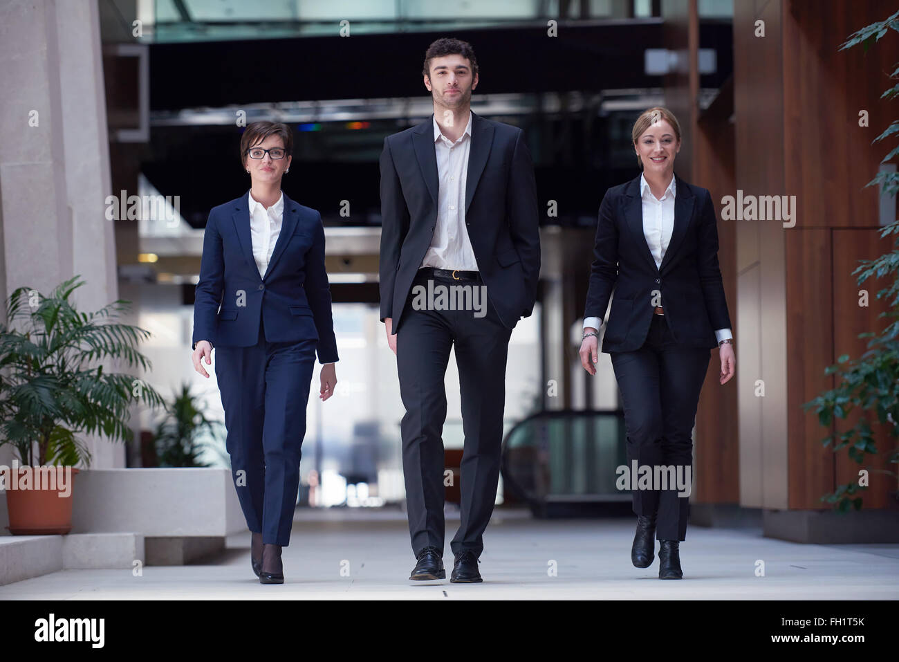 business people team walking Stock Photo - Alamy