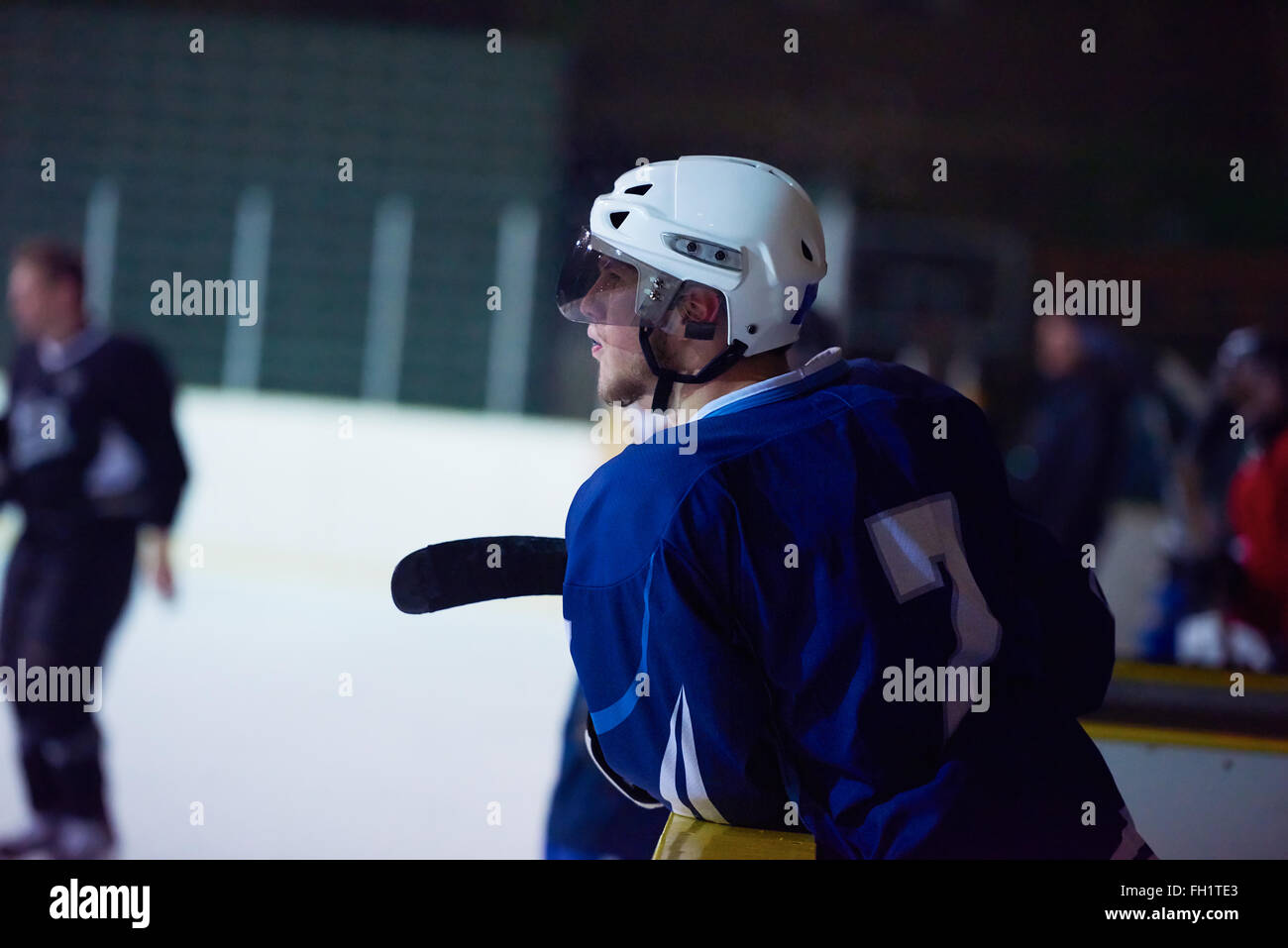 ice hockey players on bench Stock Photo - Alamy