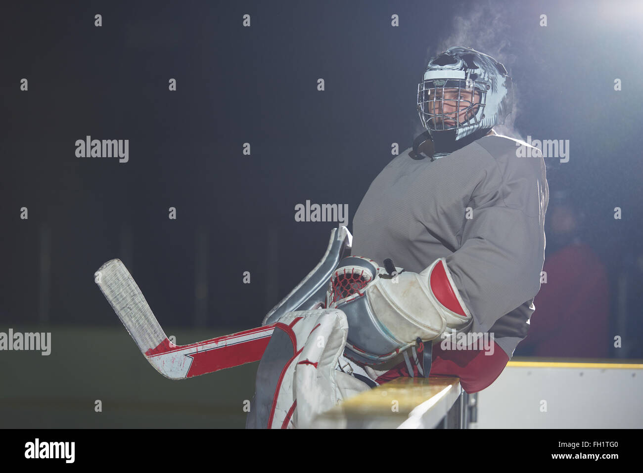 ice hockey players on bench Stock Photo - Alamy