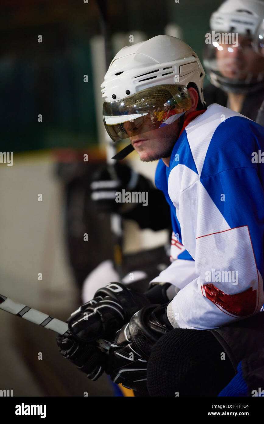 ice hockey players on bench Stock Photo - Alamy