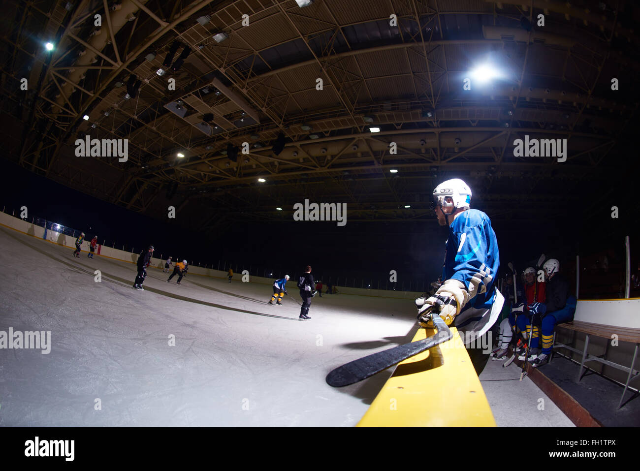 ice hockey players on bench Stock Photo - Alamy
